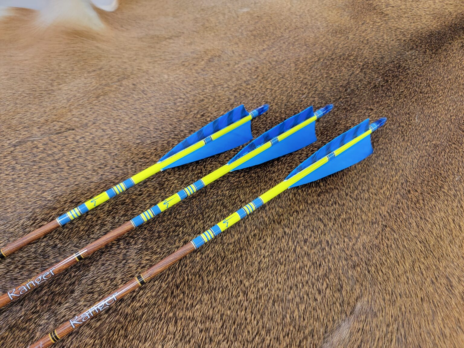 Traditional 34 Flo Yellow with Blue Crests Ranger Wood Grain Carbon ...