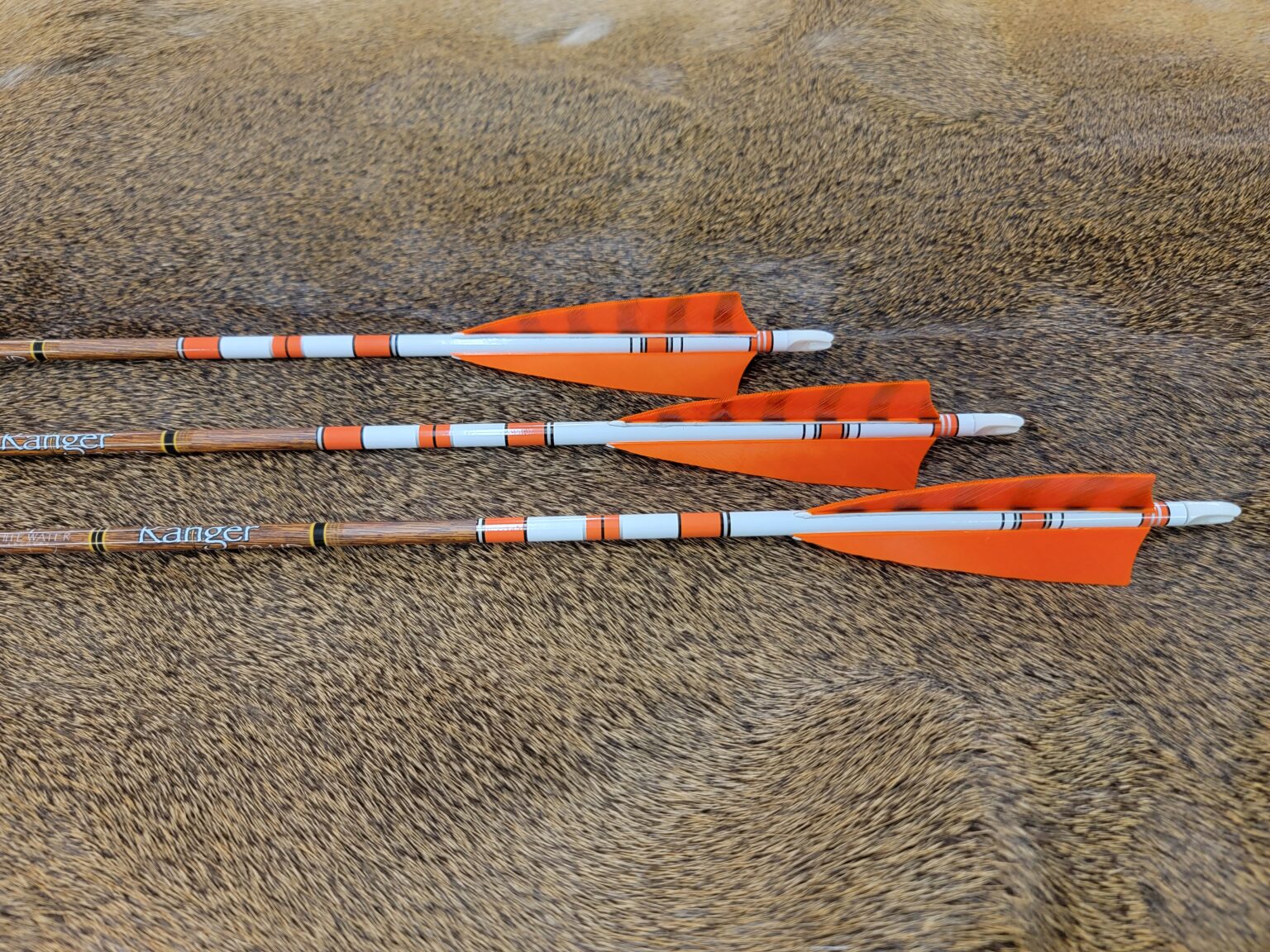 Traditional 4 White with Orange Crests Ranger Wood Grain Carbon Arrows ...