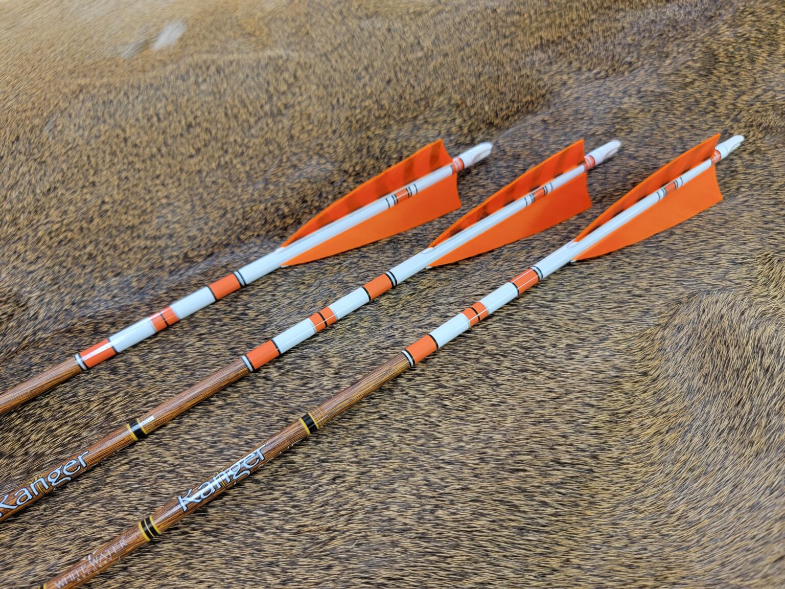 Traditional 4 White with Orange Crests Ranger Wood Grain Carbon Arrows ...